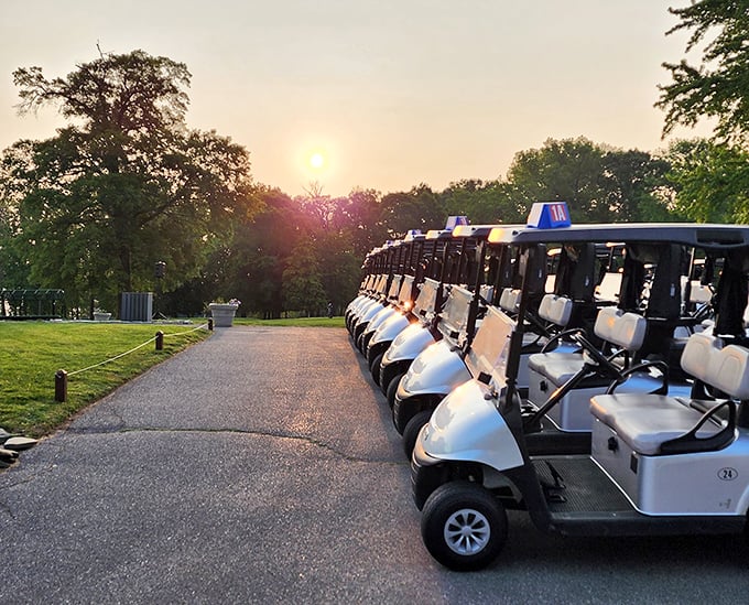 Dawn breaks over the golf carts, patiently waiting to transport visitors across verdant fairways overlooking the Chesapeake.