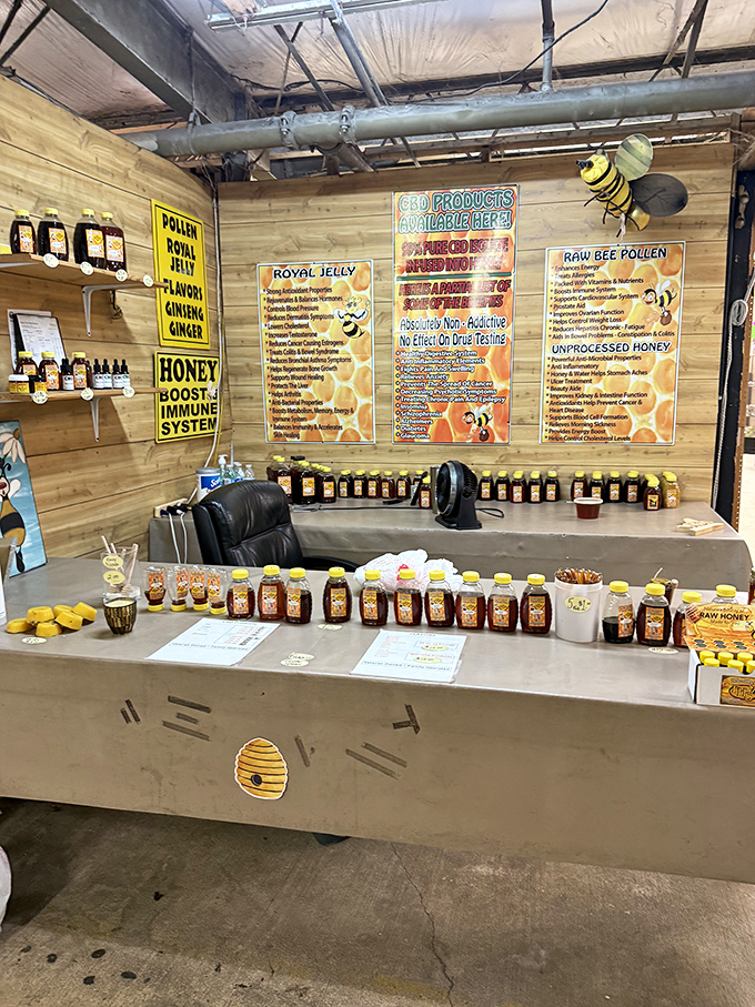 The honey stand buzzes with activity, offering liquid gold in various forms while a watchful bee mascot oversees the sweet transactions.