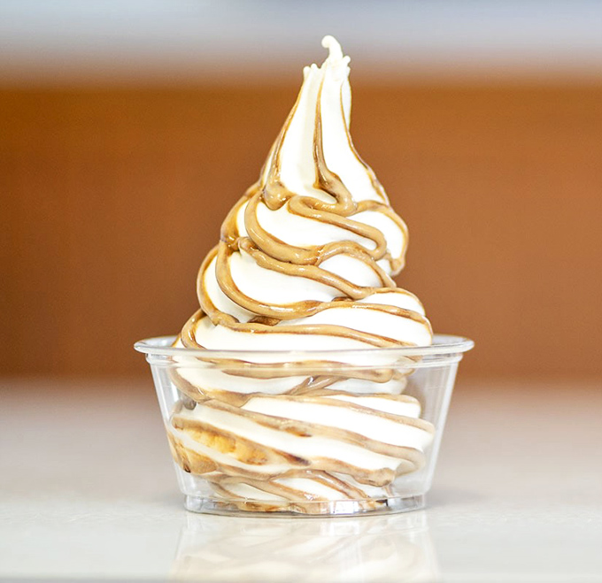 Soft-serve perfection with caramel ribbons&mdash;proof that sometimes the simplest desserts deliver the most satisfying finale to a hearty meal.