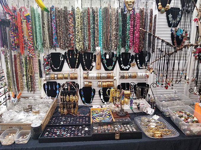 Jewelry displays shimmer under fluorescent lights, proving that adding sparkle to your life doesn't require a second mortgage.