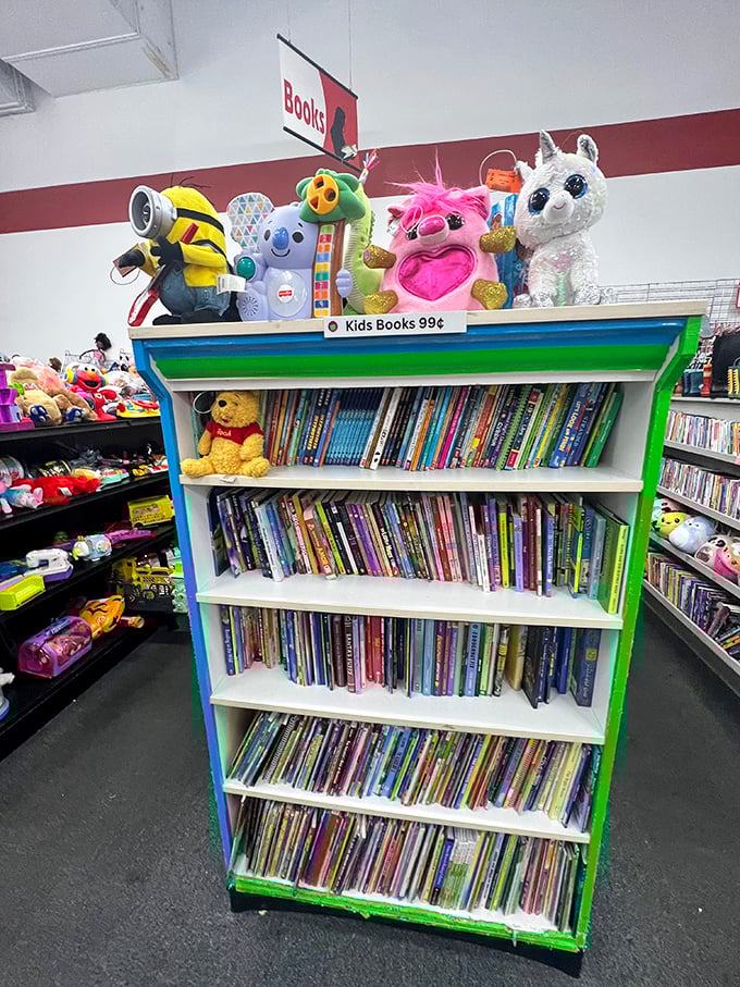 Childhood nostalgia overload! Colorful stuffed animals stand guard over books priced at 99¢, creating the perfect storm for parents with limited shelf space.
