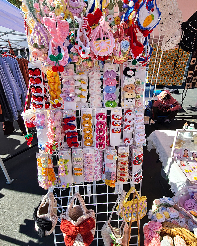 Handcrafted joy on display&mdash;these colorful crocheted treasures transform ordinary outfits into conversation starters faster than you can say "handmade."
