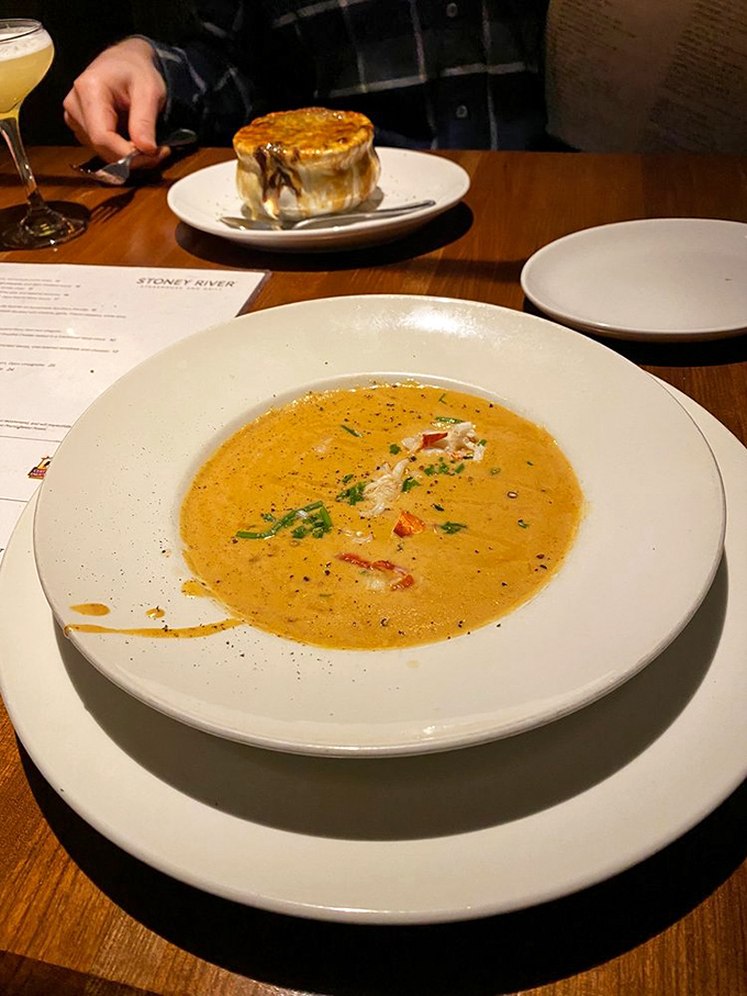 This lobster bisque isn't just soup&mdash;it's a velvety orange sea of richness with that pot pie lurking in the background like a delicious photobomber.