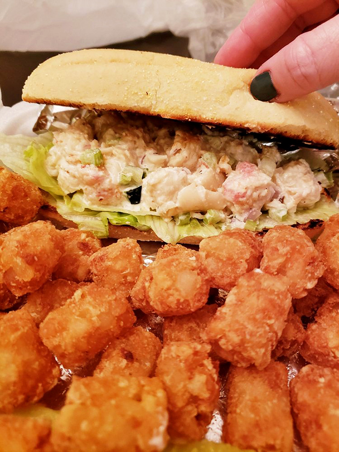 Maine's finest export meets crispy golden tots in this perfect marriage of coastal elegance.