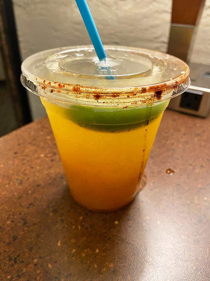 Sunshine in a glass! This mango margarita delivers a tropical vacation with each sip, rimmed with just enough spice for adventure.