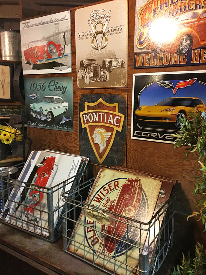 Classic automotive nostalgia lines the walls, perfect for the car enthusiast who wants to bring their passion home.