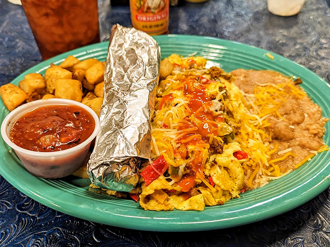 Breakfast goes technicolor with this Tex-Mex fiesta plate. Those potatoes aren't just a side &ndash; they're little crispy supporting actors in this morning drama.