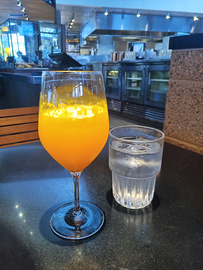 Morning sunshine captured in a glass! This mimosa practically winks at you while promising to make your brunch experience 37% more delightful.