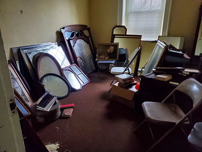 A room of abandoned mirrors reflects nothing but memories, each frame a portal to a different era of the infirmary's storied past.