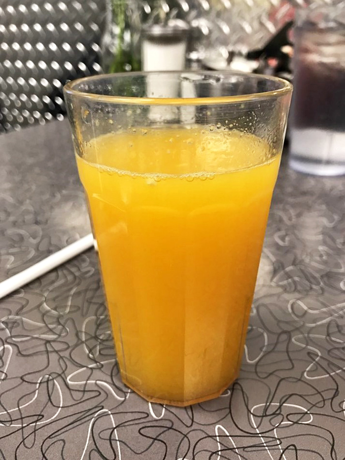 That glass of orange juice isn't just a beverage—it's liquid sunshine, the perfect acidic counterpoint to all those delicious breakfast carbs.