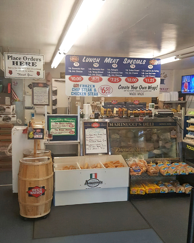 The ordering counter&mdash;where sandwich dreams are born and hunger pangs go to die&mdash;complete with handwritten specials and barrel displays.