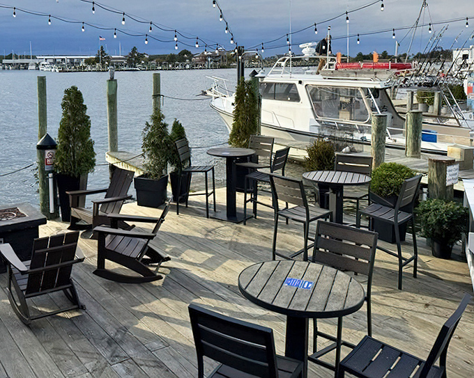 Waterfront dining that feeds your soul and your stomach. With boats bobbing nearby, even the chairs seem to relax into the coastal vibe.