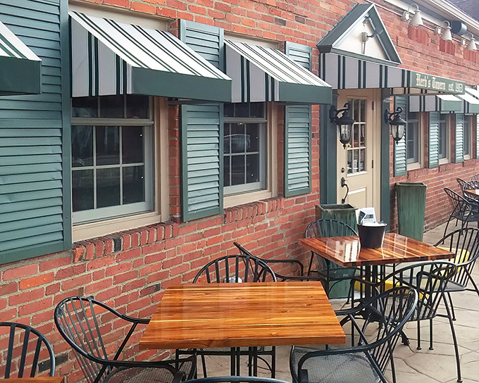 The outdoor patio&mdash;where summer afternoons stretch into evening conversations and strangers become friends over cold drinks.