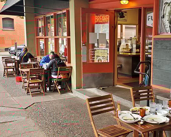 Portland's outdoor dining scene: where coffee steams in the morning air and breakfast tastes better with a side of people-watching.