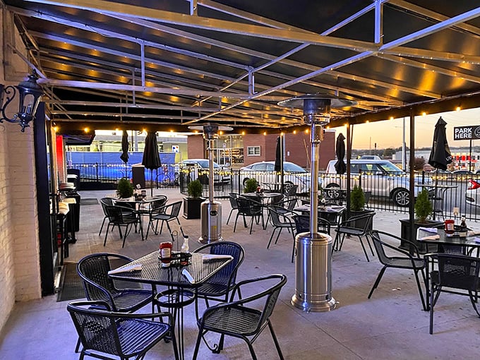 The covered patio offers an urban oasis where string lights will soon twinkle above conversations that flow as freely as the drinks.