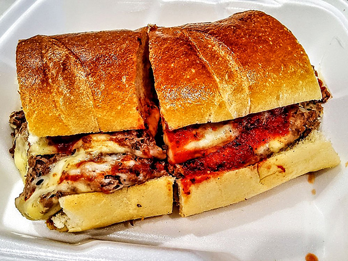 The cross-section reveals the truth: this isn't just a sandwich, it's an architectural achievement with layers that would make a geologist weep.