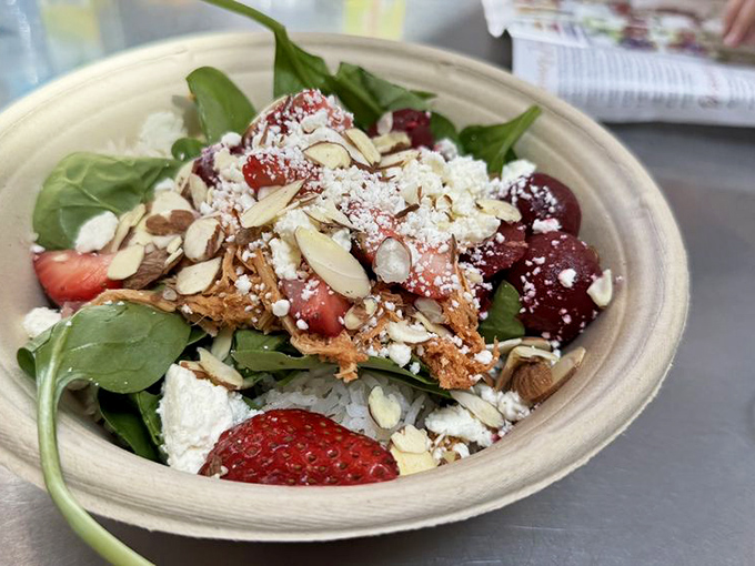 A salad that doesn't apologize for being healthy. With berries, nuts, and greens this fresh, you'll forget you once considered ranch dressing a vegetable.