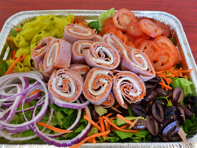 A salad that doesn't feel like punishment. Those ham roll-ups are the supporting actors stealing the vegetable show.