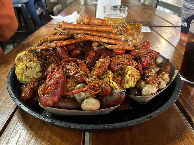 This seafood boil looks like a treasure chest exploded, spilling corn, potatoes, and crustacean gold everywhere.
