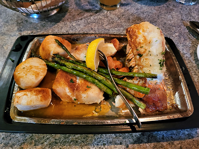 A seafood platter that brings the Mediterranean to the Midwest. Those scallops are seared with the precision of a Swiss watchmaker.