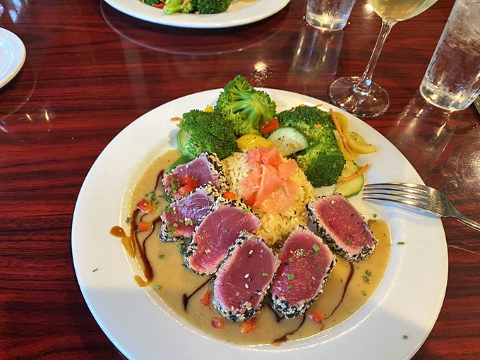 Sesame-crusted tuna that's rare in the center, surrounded by a moat of sauce so good you'll want to request a straw.