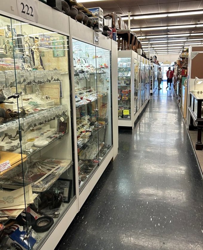 Glass cases protecting memories like time capsules. Booth 222 might just hold the baseball card your father tearfully recalls his mother throwing away.