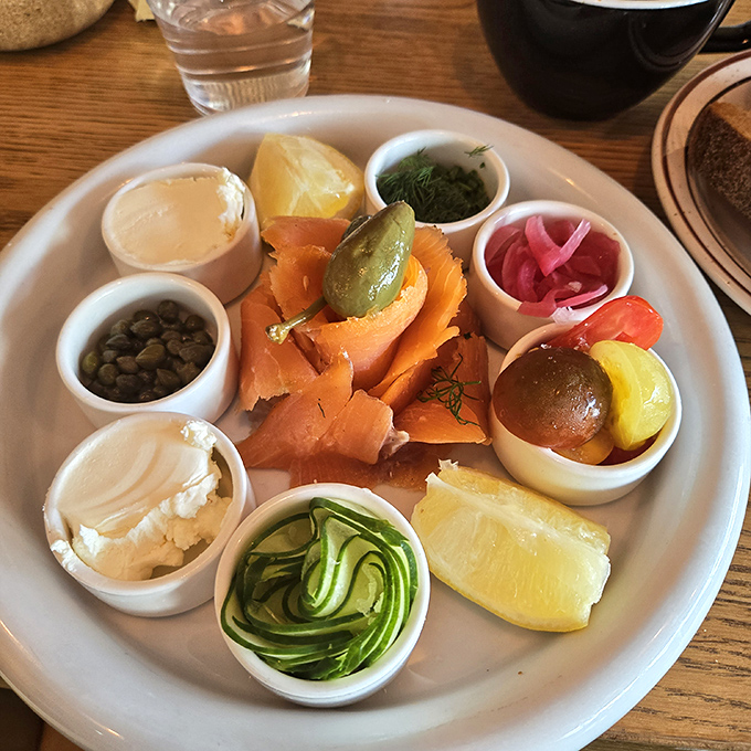 Not just a salmon platter &ndash; it's a color wheel of culinary delights where each tiny cup holds a perfect complement to the silky smoked fish.