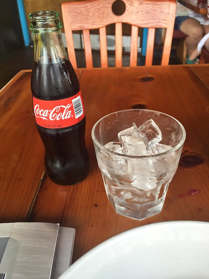 Even the classic Coca-Cola gets the proper Southern treatment&mdash;glass bottle, plenty of ice, and a wooden table that's seen thousands of good meals.