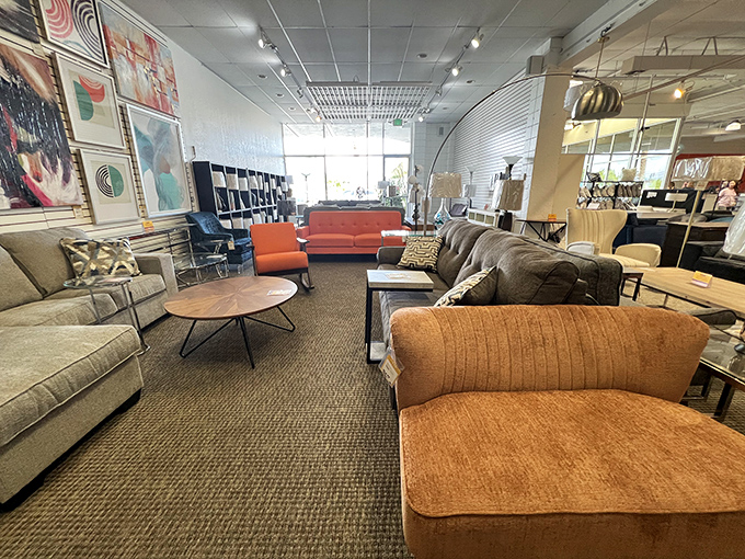 The sofa lineup looks like a mid-century design reunion, each piece silently bragging about the famous derrieres it once supported.