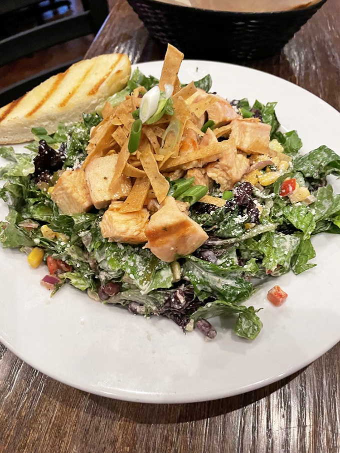A salad that makes eating greens feel like cheating&mdash;where crisp vegetables, tender chicken, and crunchy tortilla strips create the perfect bite.