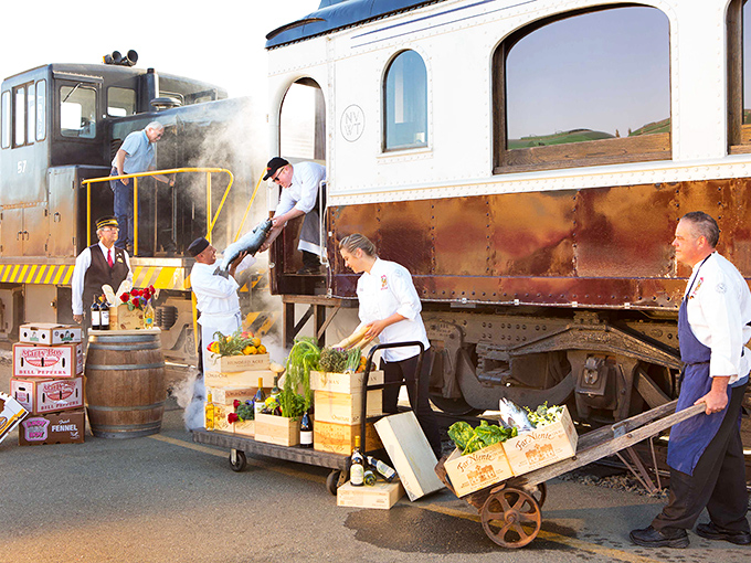 Farm-to-train-table in action: Chefs load fresh local produce directly onto the galley, ensuring your meal was probably picked while you were sipping your welcome champagne.