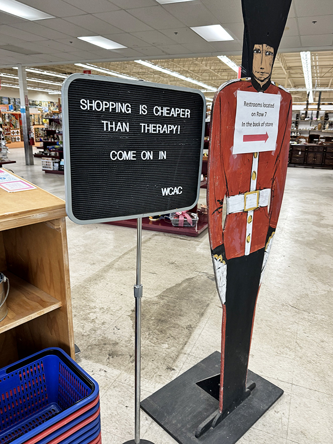 "Shopping is cheaper than therapy" &ndash; words to live by at the entrance, where a British guard cutout stands at attention, directing you to bathroom relief.