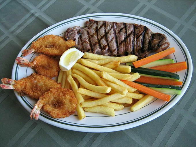 Surf meets turf in this generous plate – steak and shrimp creating the ultimate indulgent dining experience.