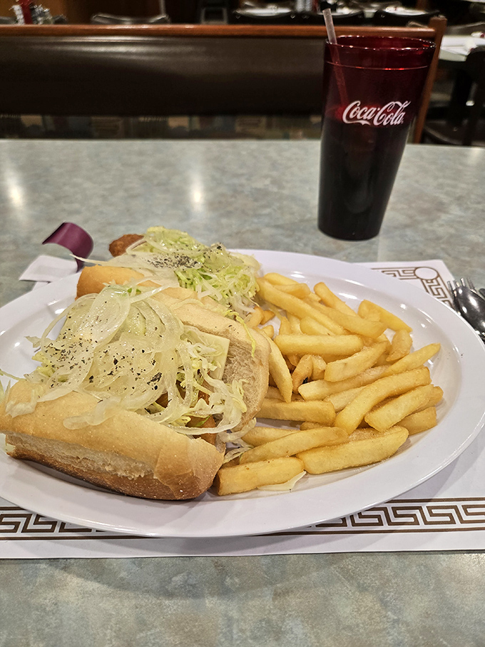 Submarine sandwiches paired with golden fries create the kind of lunch that fuels afternoon adventures.