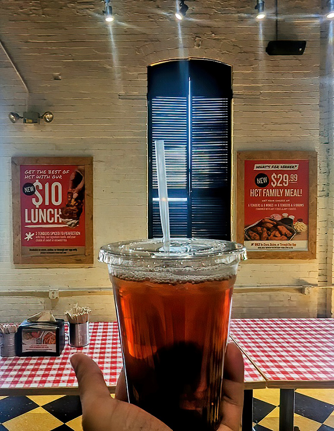 Sweet tea – the unofficial fire extinguisher of hot chicken establishments, served in a generous cup that'll keep you coming back.