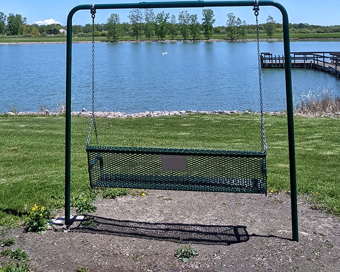 The lakeside swing&mdash;where adults remember what childhood felt like and kids practice the fine art of "higher, higher!"