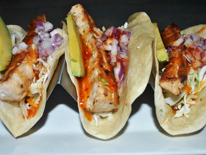 These tacos bring a fiesta to your taste buds with grilled chicken, fresh avocado, and just enough kick to remind you life's too short for bland food.