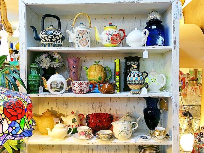 A teapot collection that could tell stories spanning continents and centuries. Alice's Mad Hatter would feel right at home here.
