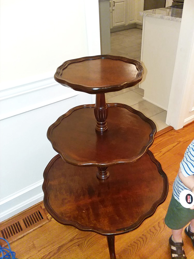 The three-tiered pie crust table isn't just furniture&mdash;it's functional sculpture. Perfect for displaying your collection of&hellip; well, anything really.