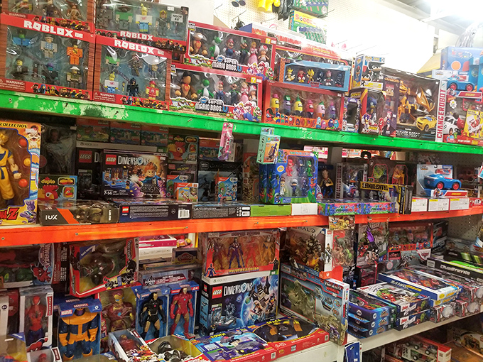 The toy section: where parents make promises, grandparents fulfill them, and everyone remembers what it was like to want everything behind the plastic.