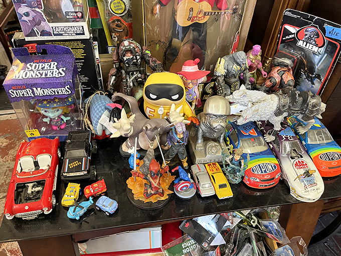 Action figures, collectibles, and childhood memories arranged in beautiful chaos&mdash;one person's decluttering becomes another's nostalgic jackpot.