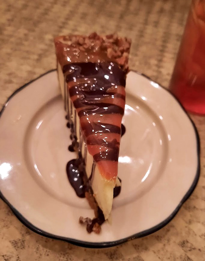 Turtle cheesecake that's worth loosening your belt for, because some desserts demand complete surrender to indulgence.