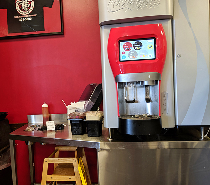 Where the liquid refreshment magic happens. The soda fountain stands ready to provide the perfect complement to your sandwich masterpiece.