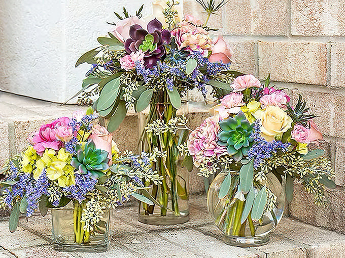 
With Dollar Tree vases and some backyard greenery, you can create floral arrangements that look like they cost a week's grocery budget.
