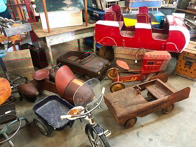 Childhood dreams parked in perfect formation. These vintage pedal cars remind us of simpler times when horsepower was measured in little legs.