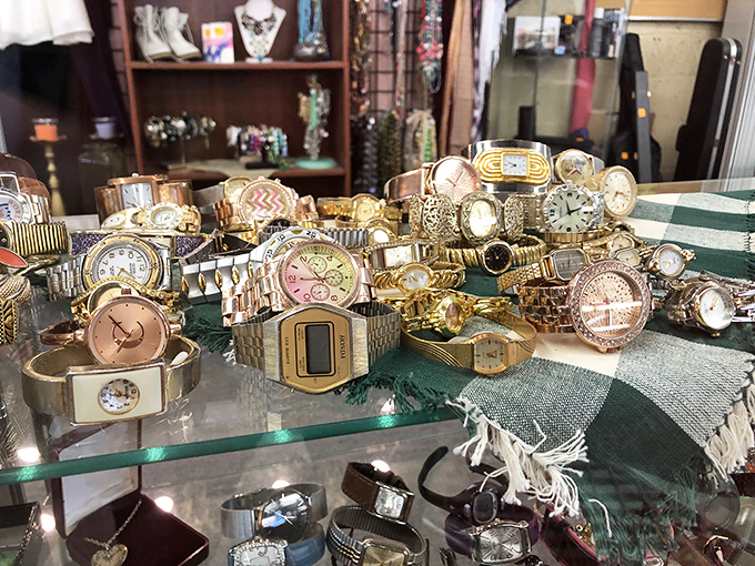 The watch display sparkles with timepieces that once marked important moments and are ready to tick through yours.