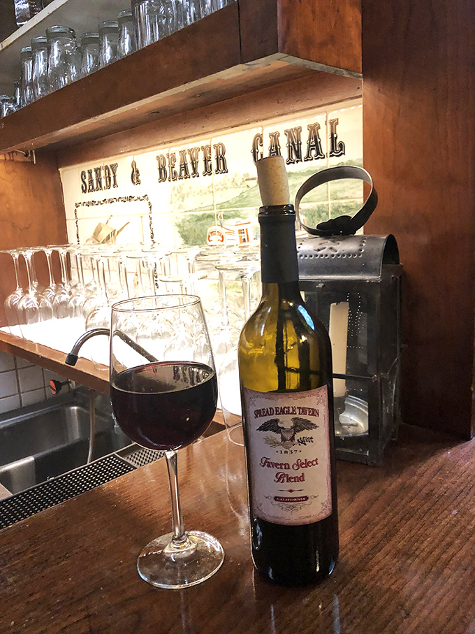 Their house wine sits beside a historical canal illustration&mdash;both transport you somewhere wonderful. One sip and suddenly Ohio feels remarkably like Tuscany.