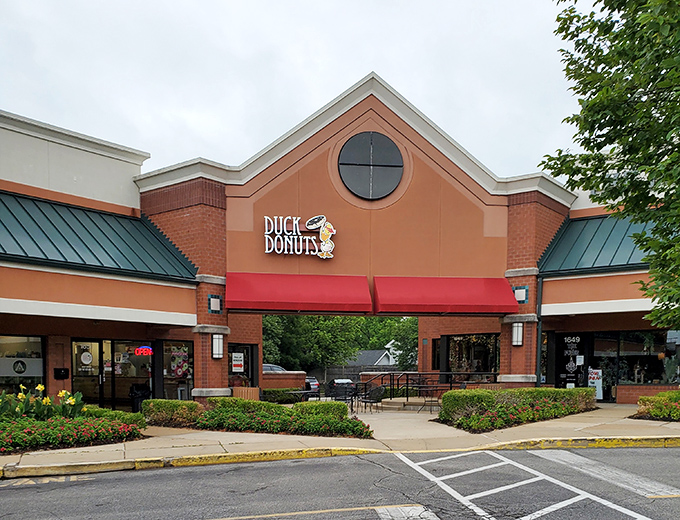 That playful duck logo promises something different! Made-to-order donuts that quack... I mean crack... the code of breakfast perfection.