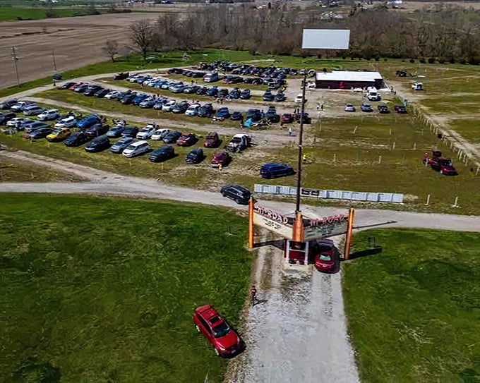 Hi-Road Drive-In's massive screen against the night sky. Something magical about animated characters towering over our everyday vehicles.