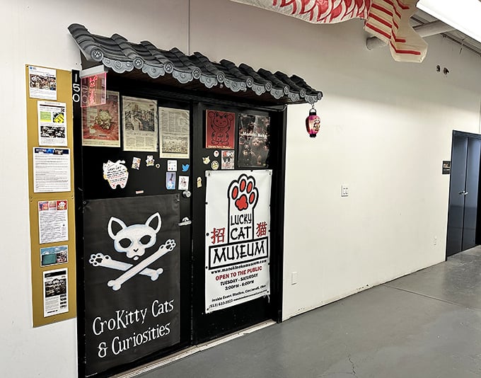 Behind this quirky entrance lies a feline wonderland. Cat lovers and good-luck seekers, your purrfect destination awaits!